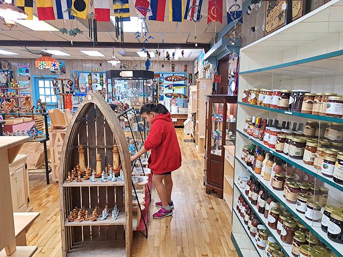 Inside Dutch Haven, maritime flags flutter overhead while shelves overflow with local treasures and edible gold.