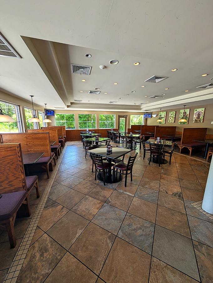 Sunlight streams through large windows, illuminating wooden booths and tile floors&mdash;the perfect setting for plotting your next meal conquest.