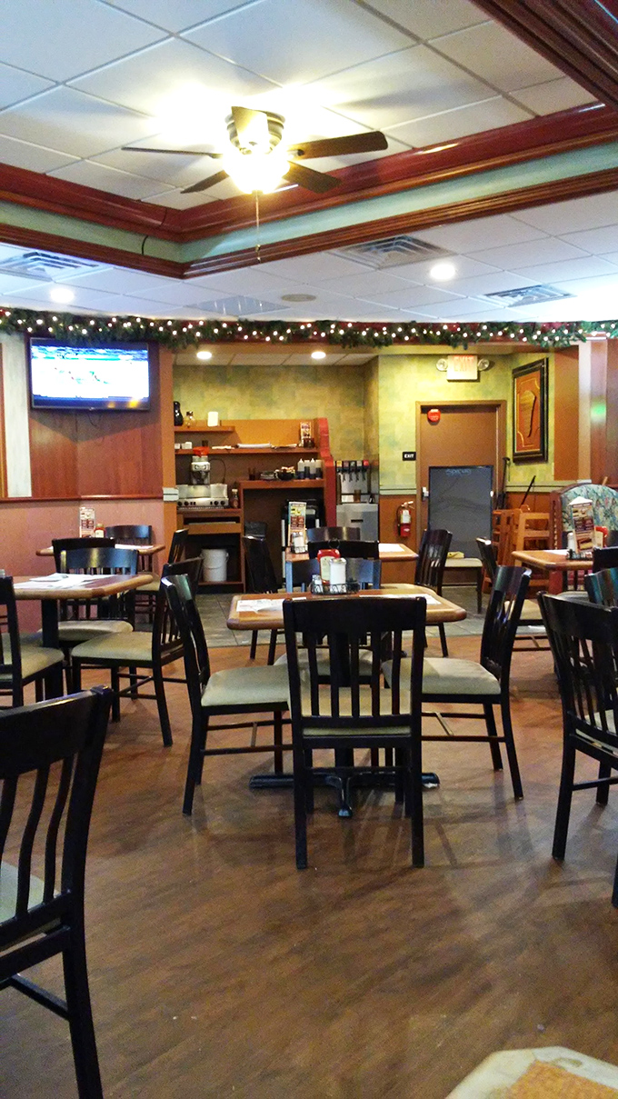 Warm wood tones, comfortable seating, and ceiling fans create that perfect "everybody knows your name" atmosphere that keeps locals coming back decade after decade.