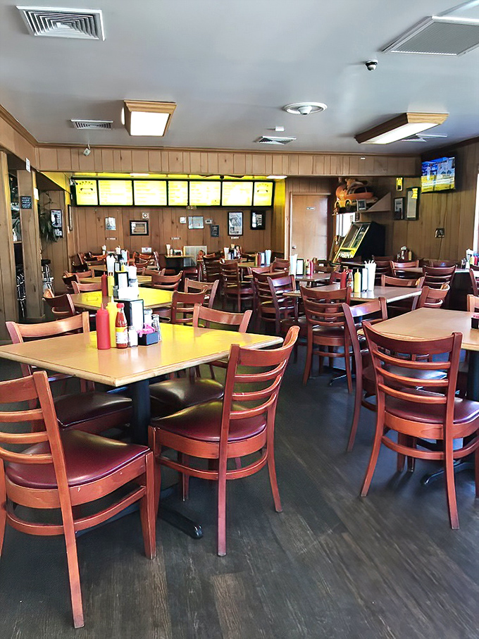 Wooden tables, leather booths, and copper accents create the perfect backdrop for fried chicken revelations. Casual elegance meets comfort food paradise.