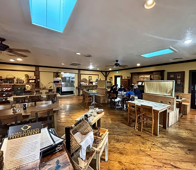 Wide-plank floors and blue skylights create a space that's both rustic and refined&mdash;like dining in a Pinterest board that serves incredible food.