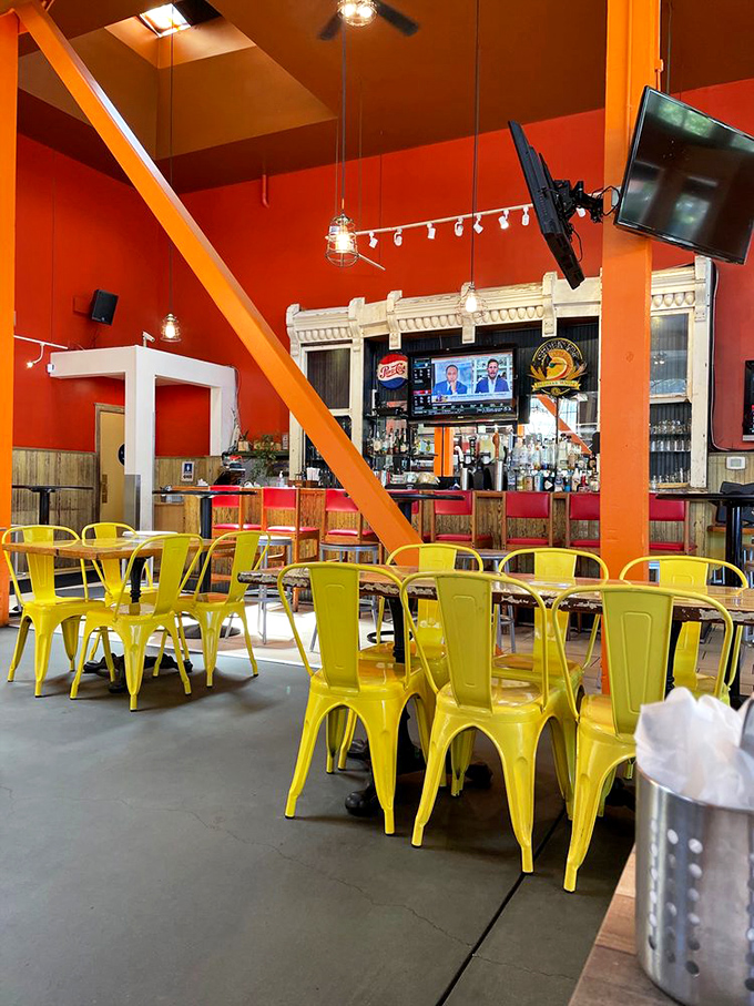 Inside, vibrant red walls and bright yellow chairs create a warm, unpretentious atmosphere where the only thing that matters is what's on your plate.