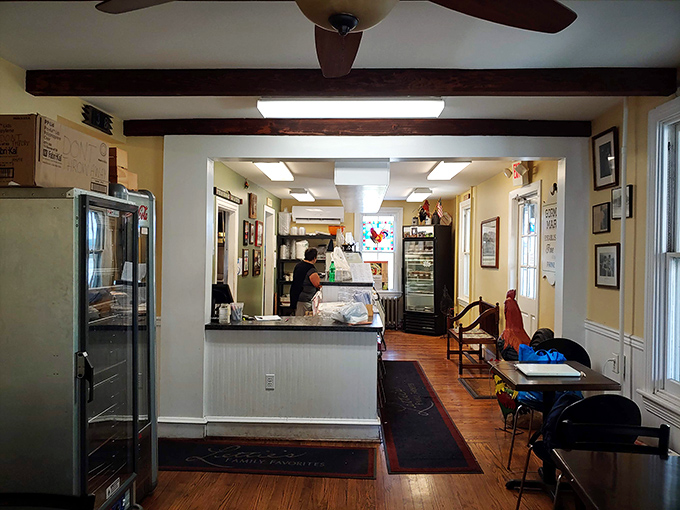 Step inside and feel the anticipation build. This narrow hallway leads to flavor country, where Southern comfort meets Delaware charm.