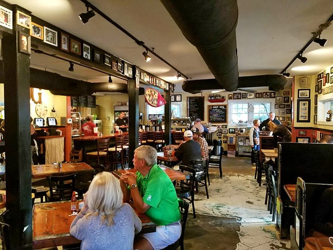 Inside, hundreds of framed dog photos create a gallery of furry memories while diners tuck into plates that would make any food lover howl with delight.