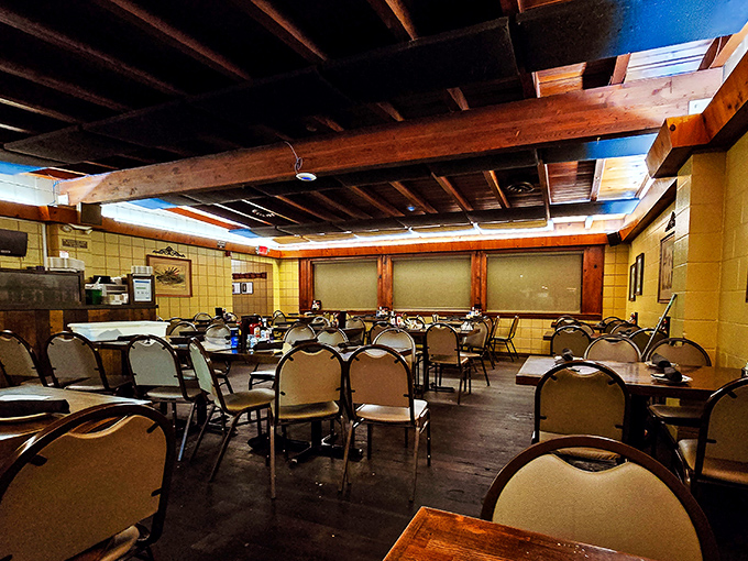 Simple chairs, yellow walls, and wooden beams that have witnessed decades of "Did you taste that?" conversations. This isn't Instagram-bait d&eacute;cor&mdash;it's the real deal.