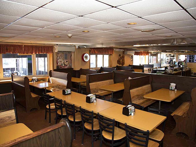 Classic wooden booths and no-nonsense tables set the stage for the real star&mdash;the food. This isn't about ambiance; it's about anticipation.