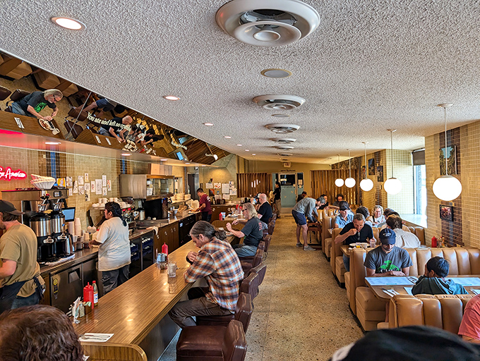 Inside, time stands still as leather booths and counter stools invite you to join the symphony of clinking plates and morning conversations.