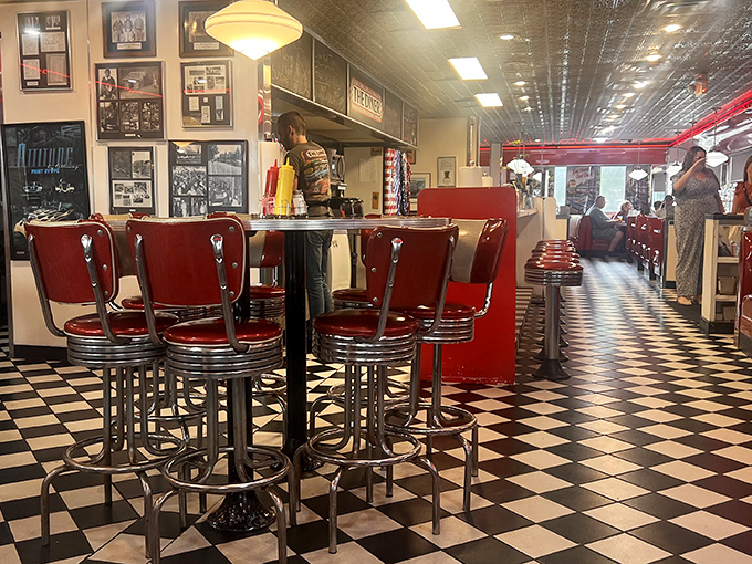 Red vinyl meets chrome in this temple to mid-century dining. The checkered floor practically begs you to order a malt and pretend Elvis might walk in any minute.