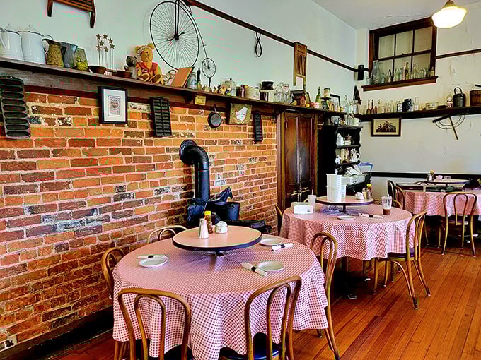 Step inside where exposed brick walls and checkered tablecloths create pure nostalgic dining magic.