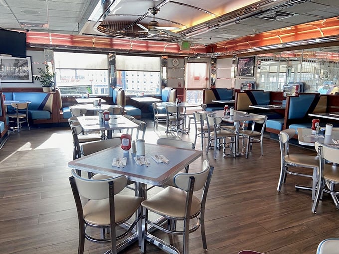 Classic diner aesthetics meet modern comfort in this bright, airy dining room where every booth promises the possibility of breakfast nirvana.