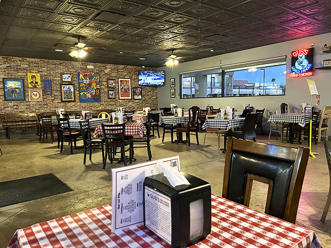 Classic checkered tablecloths and exposed brick walls create the perfect backdrop for chicken-induced euphoria. The tin ceiling adds that touch of vintage charm.