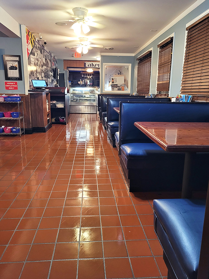 Classic navy booths, gleaming terra cotta floors, and ceiling fans spinning lazily overhead&mdash;Marie's interior feels like stepping into a Norman Rockwell painting that serves incredible food.