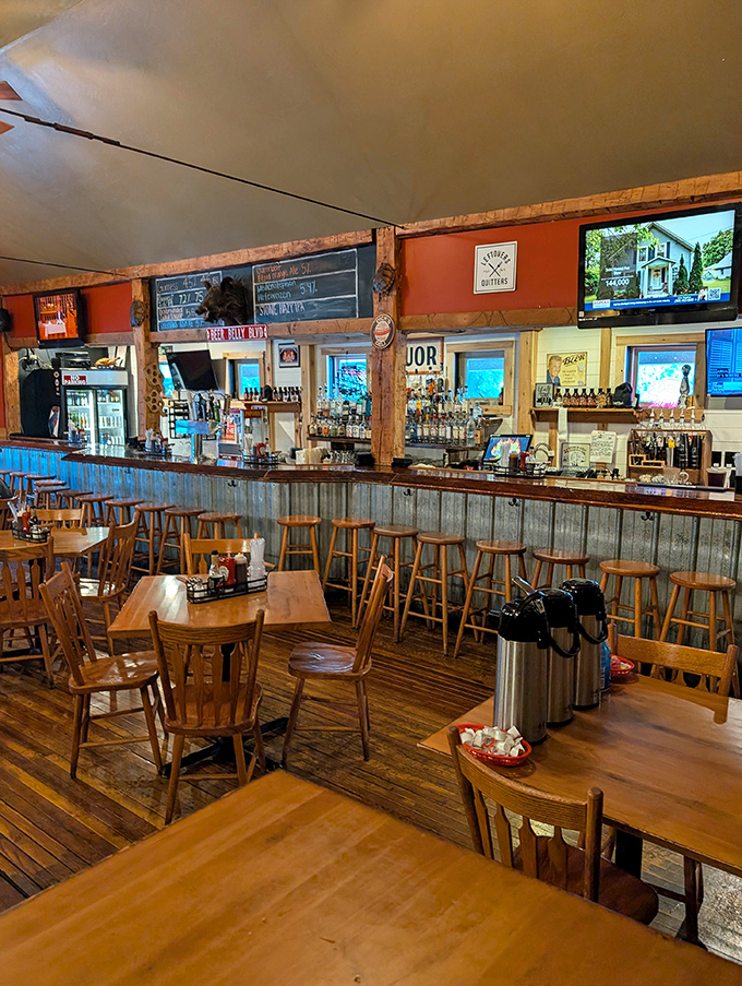 Step inside and you're greeted by that perfect blend of rustic charm and beer-lover's paradise. Those wooden beams have witnessed countless barbecue epiphanies.