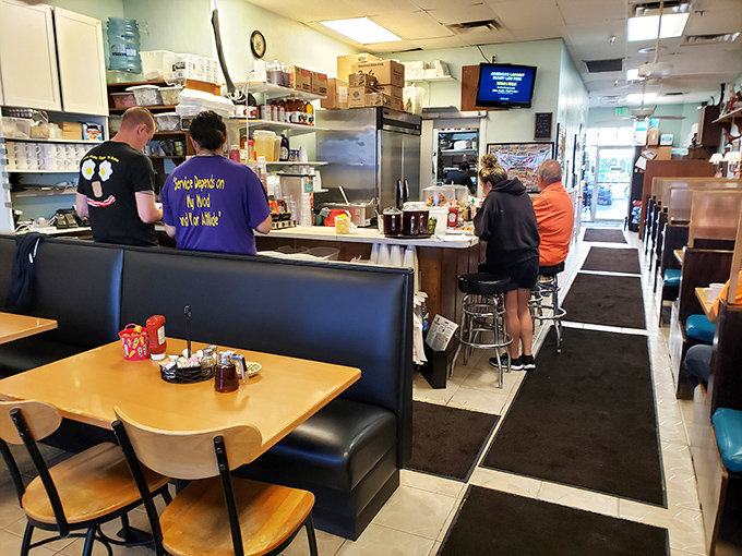 Counter seating: where breakfast voyeurs get front-row tickets to the morning symphony of sizzling, flipping, and the occasional spatula acrobatics.