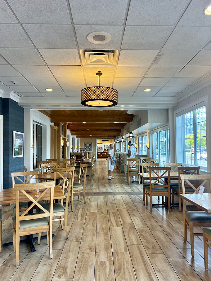 Warm wooden floors and cross-back chairs create an atmosphere that's both spacious and cozy&mdash;like dining in a particularly well-designed country home.