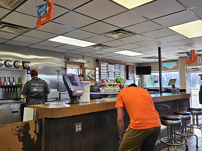 Where magic happens: The no-frills counter where generations have leaned forward in anticipation, watching their loose-meat sandwiches come to life.