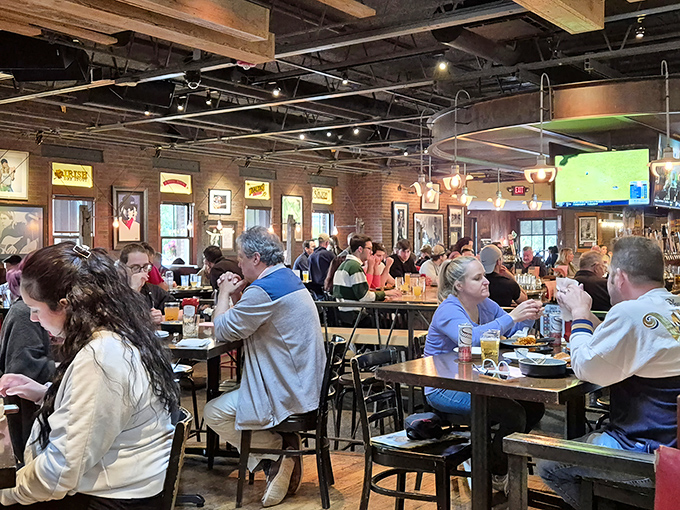 Inside, the exposed brick and wooden beams create that perfect "third place" vibe&mdash;not home, not work, but somewhere you'd happily spend hours with friends and strangers alike.