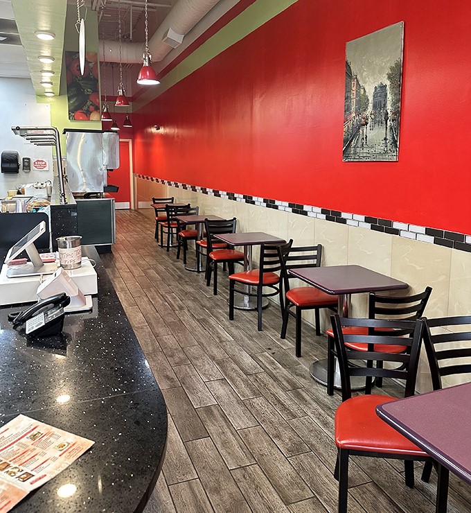 Red walls and simple furnishings say "we put our energy into the food, not the decor." The kind of place food critics whisper about to their closest friends.