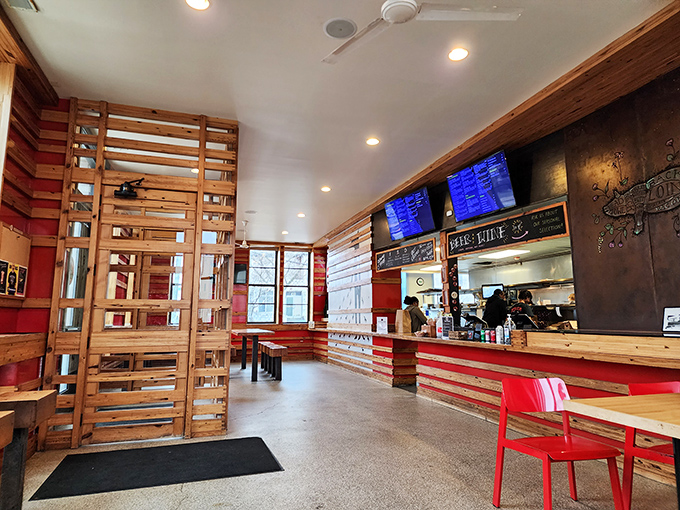 No-frills, all-thrills interior where wooden slats and red accents create the perfect backdrop for the serious business of barbecue consumption.