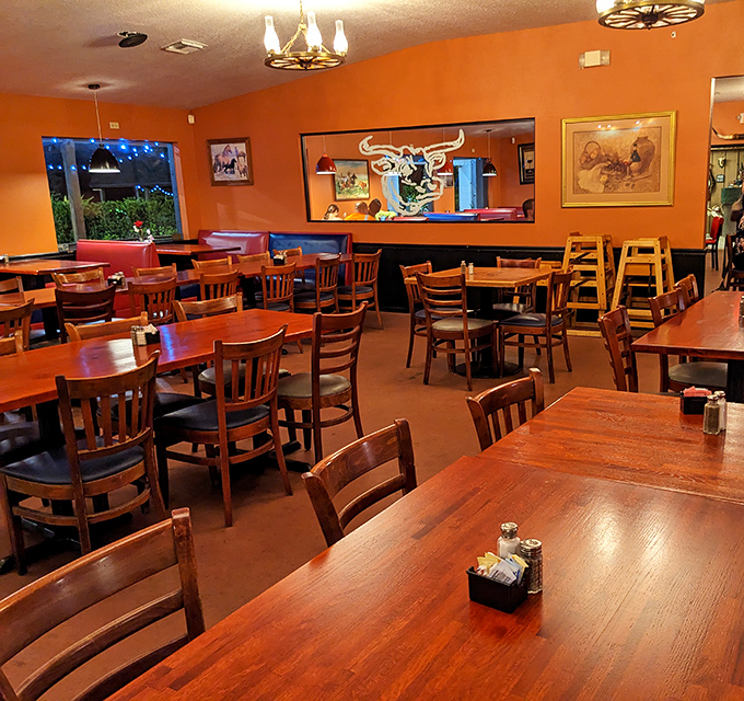 Warm orange walls and sturdy wooden tables create the perfect backdrop for meat-centric memories. This isn't Instagram decor&mdash;it's the real, unpretentious deal.