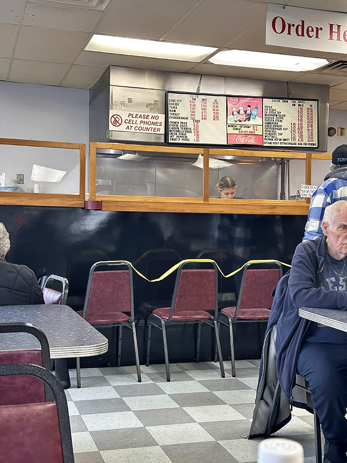 Where vinyl seats and checkered floors create the perfect backdrop for tuna sandwich enlightenment.