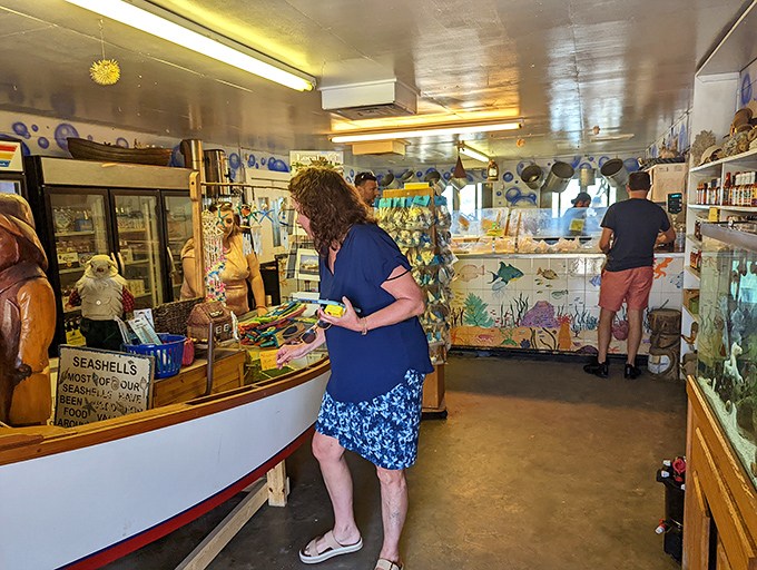 Inside the market, treasures of the sea await. Customers browse fresh catches while nautical decor reminds you this isn't just a restaurant&mdash;it's a working fish market.