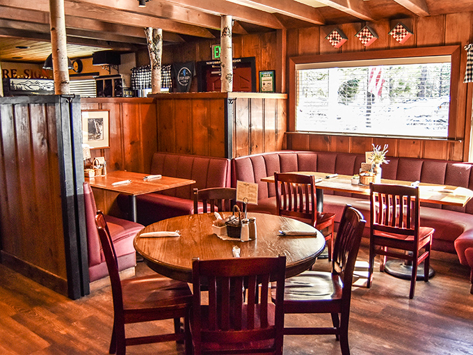 Rustic wood-paneled warmth meets burgundy booth comfort. This isn't just dining &ndash; it's the mountain cabin breakfast experience you've been craving.