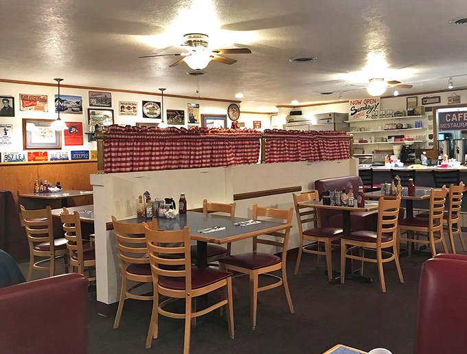 Classic Americana comes alive inside with red checkered curtains, wooden booths, and walls that tell stories through vintage memorabilia. Nostalgia served daily.