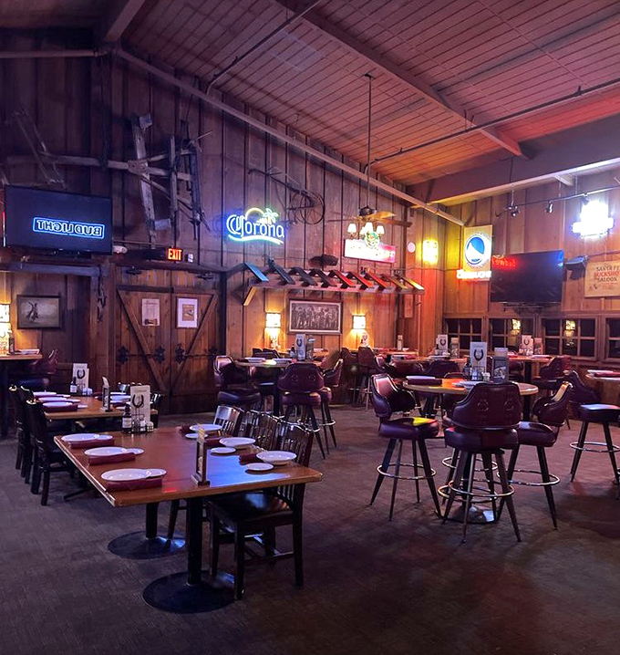 Step into a time machine disguised as a dining room. The wooden walls, neon beer signs, and rustic charm create the perfect backdrop for meat-induced euphoria.
