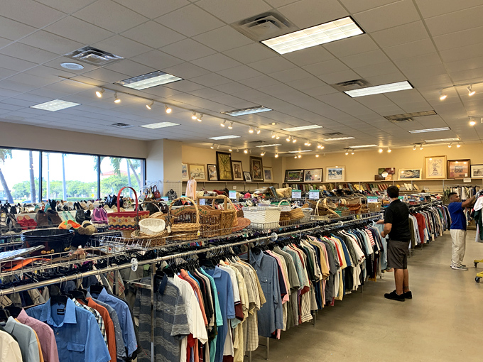 Rows upon rows of meticulously organized clothing stretch toward the horizon&mdash;like a rainbow of second chances waiting to be discovered.