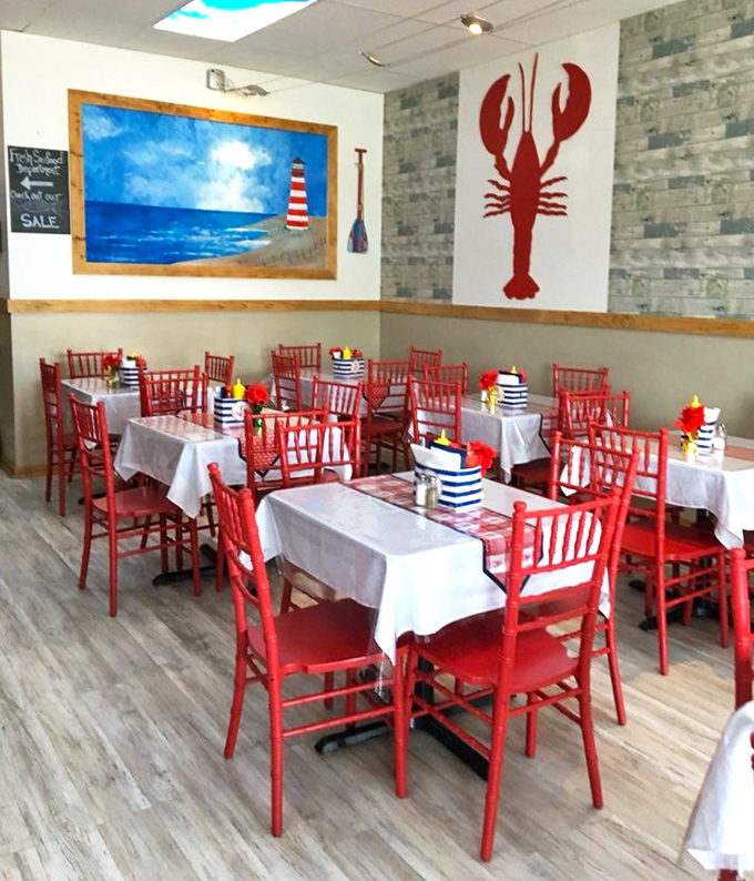 Red chairs and nautical decor transport you straight to New England. That lobster on the wall isn't subtle, but neither is the flavor you're about to experience.
