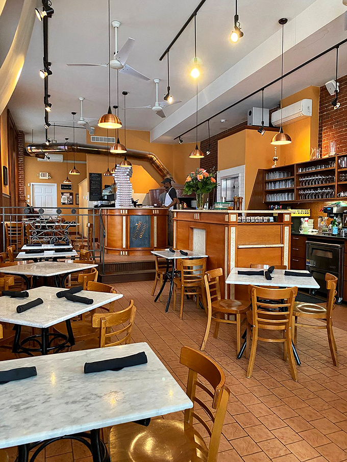 Warm golden walls, marble tabletops, and that inviting wooden bar &ndash; this isn't just a restaurant, it's Pittsburgh's living room with better food.