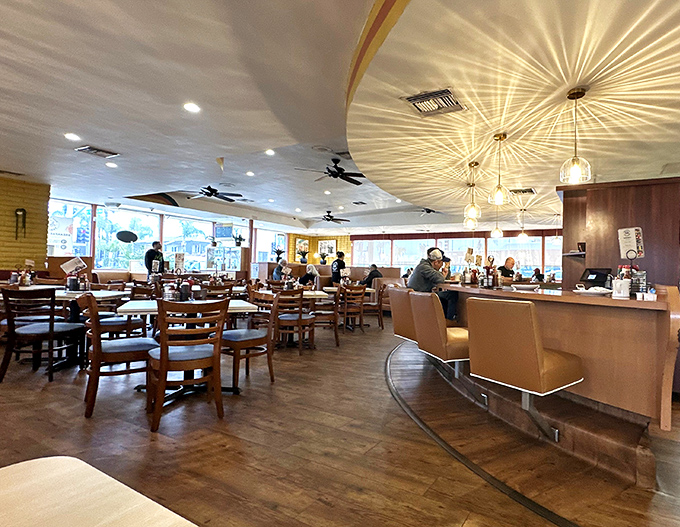 Where breakfast dreams come true. The warm wood tones and curved counter create that perfect diner atmosphere&mdash;not too fancy, not too casual, just right for focusing on the food. 