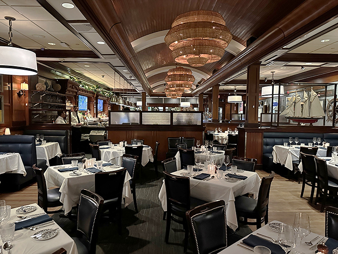 Step inside and you're transported to a maritime dream&mdash;rich wood paneling, white tablecloths, and chandeliers that would make Neptune himself feel at home.