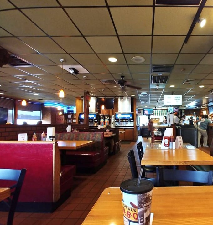 No-frills interior where the focus is exactly where it should be: on the food. Red booths have witnessed countless BBQ epiphanies.