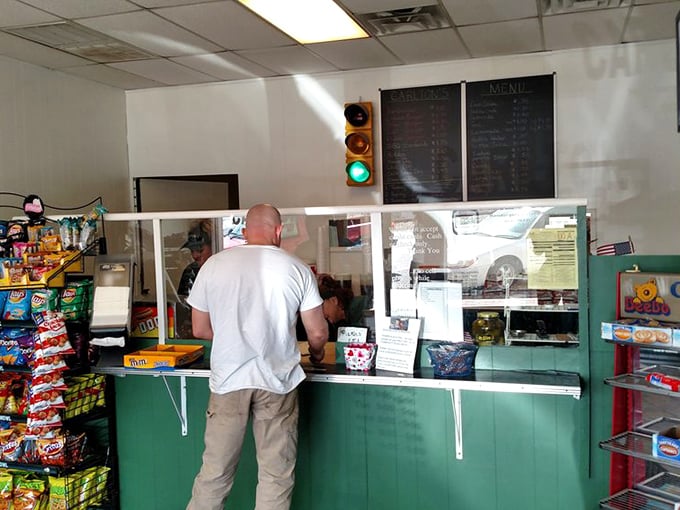 No frills, just thrills. The traffic light on the wall isn't directing traffic&mdash;it's giving a permanent green light to burger perfection.
