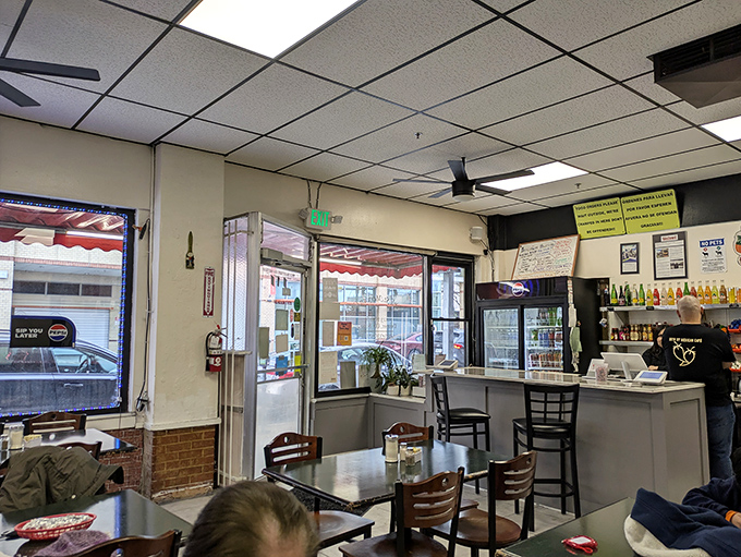 No-frills interior with drop ceiling tiles and simple tables&mdash;the universal code for "the food here is going to be spectacular."