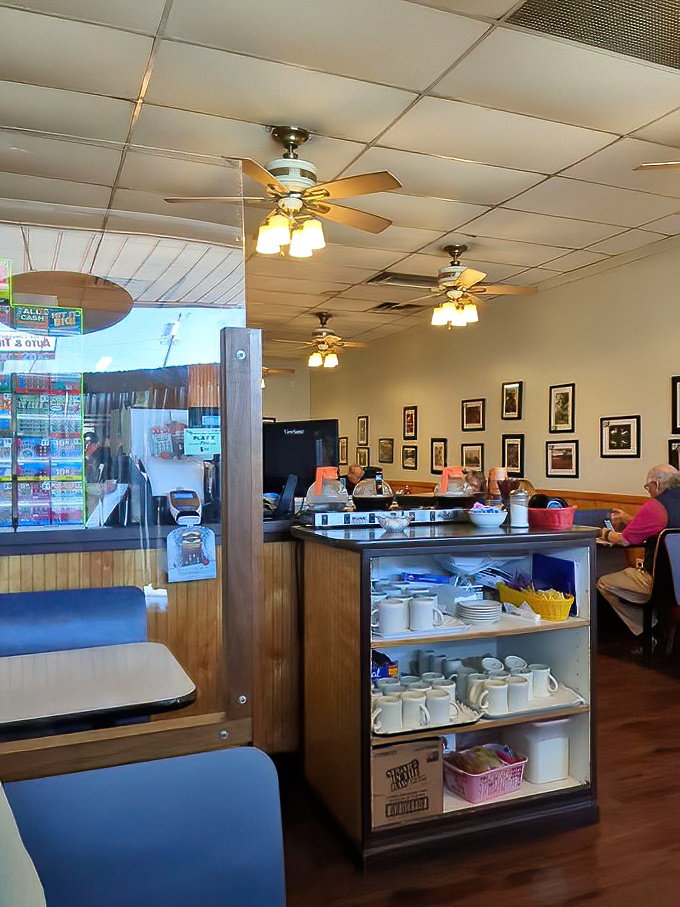 Classic diner ambiance with ceiling fans, wood paneling, and coffee mugs at the ready&mdash;exactly as breakfast should be.