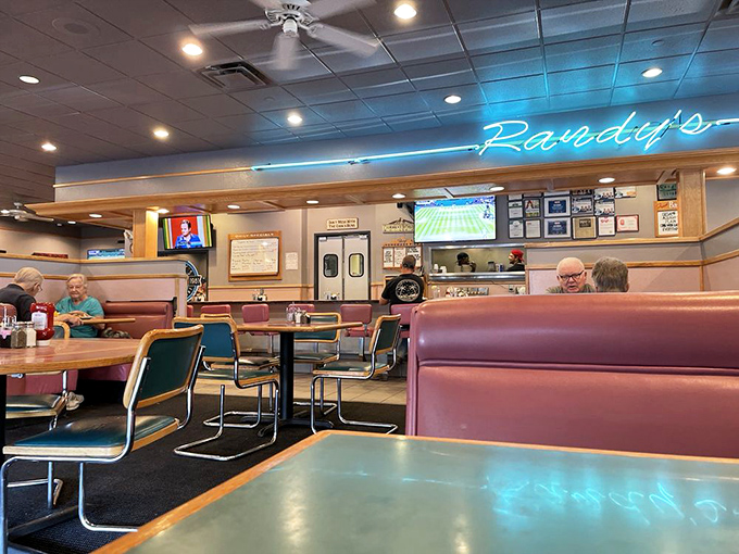 Classic diner aesthetics meet Arizona comfort at Randy's, where that blue neon glow has illuminated countless family meals and morning-after recovery breakfasts.