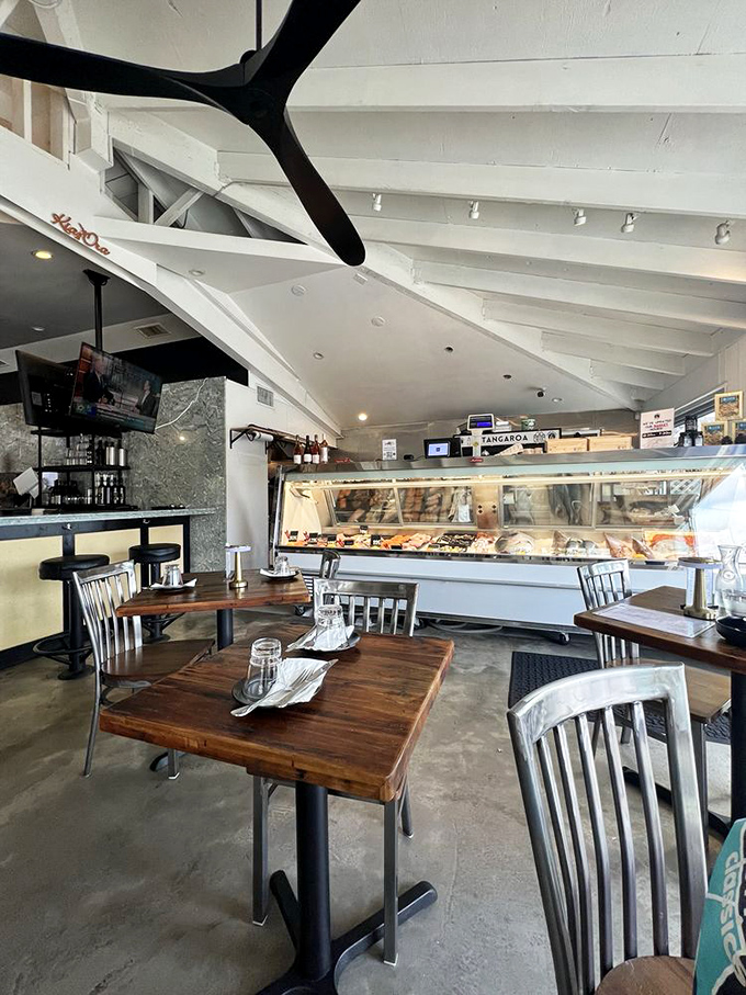 White beamed ceilings and that dramatic propeller overhead – like dining in a stylish boat house where the catch of the day is always spectacular.