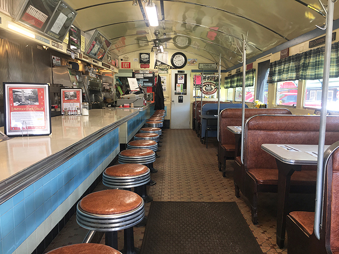 This gleaming counter and those swivel stools have hosted more life stories than a therapist's couch.