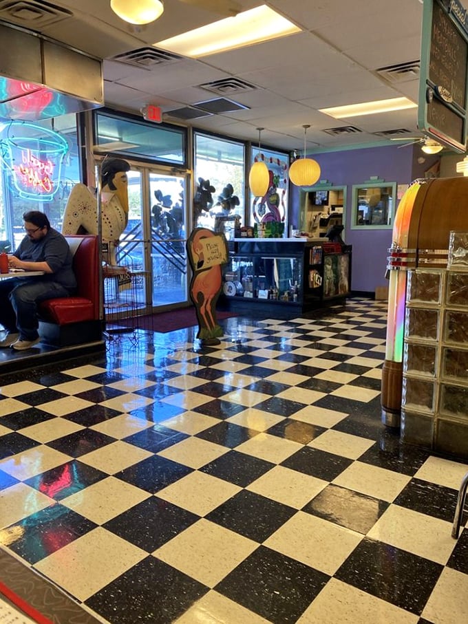 Classic black and white checkered floors set the nostalgic stage while quirky decor (hello, Elvis!) reminds you this isn't your average greasy spoon.