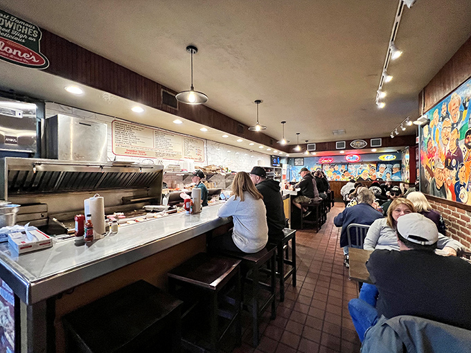 Where sandwich magic happens. The open kitchen layout lets you witness the assembly of these legendary towers of deliciousness.