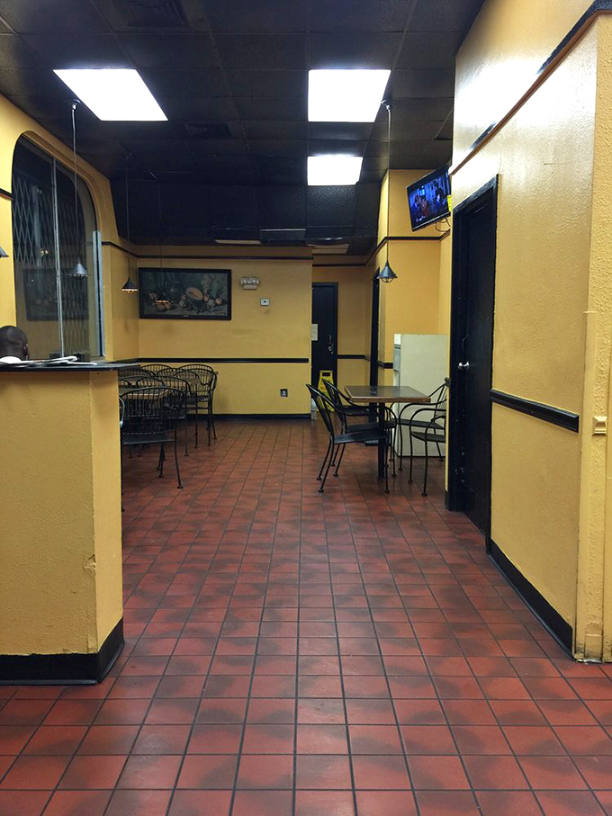 No-nonsense interior where fluorescent lights illuminate your destiny: choosing between catfish, shrimp, or why not both?