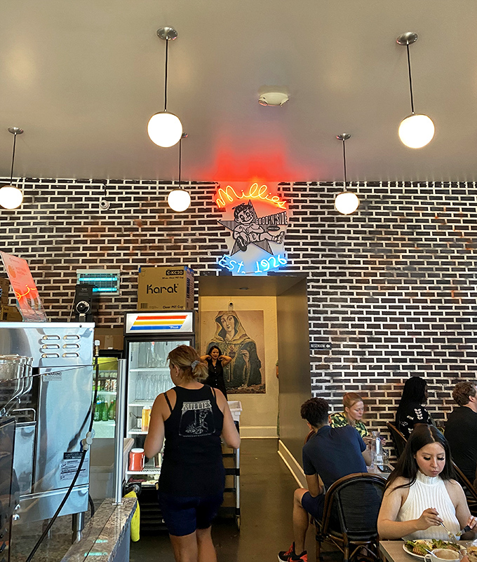 Exposed brick and pendant lights create the kind of ambiance that makes everything taste better&mdash;it's science, probably.