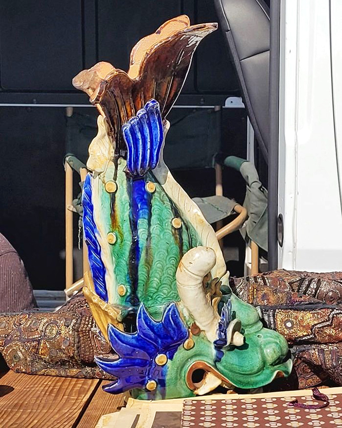 Not your average garden ornament. This vibrant ceramic dragon would make even Marie Kondo reconsider her minimalist approach to decorating.