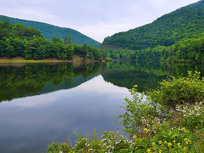 Mountains embrace the lake in a perfect geological hug. This mirror-like water makes narcissistic mountains stare at themselves all day long. 