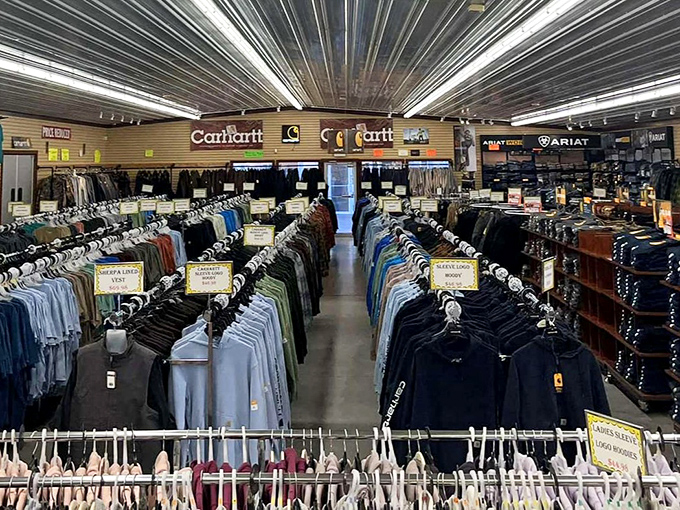 Inside the clothing section, rows of Carhartt and Ariat await like a wardrobe department for a movie about people who actually know how to fix things.