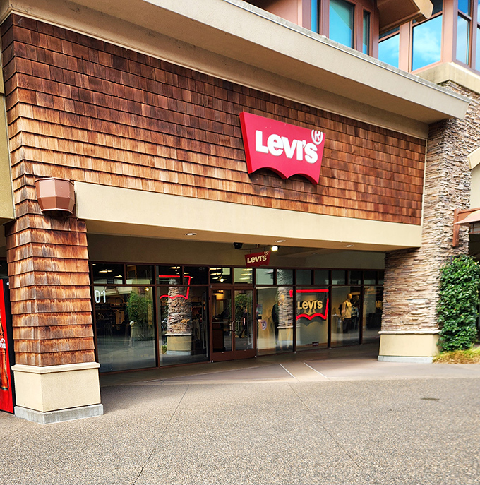 Levi's iconic red tab beckons from its rustic wooden fa&ccedil;ade. Where denim dreams come true without emptying your wallet.