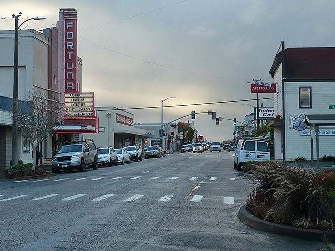 Main Street's vintage theater sign stands tall, promising entertainment that doesn't require a streaming subscription or reading glasses for subtitles.